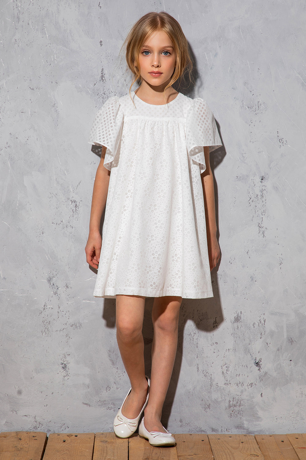 White flowy dress with dots and floral pattern with frilled sleeves ...
